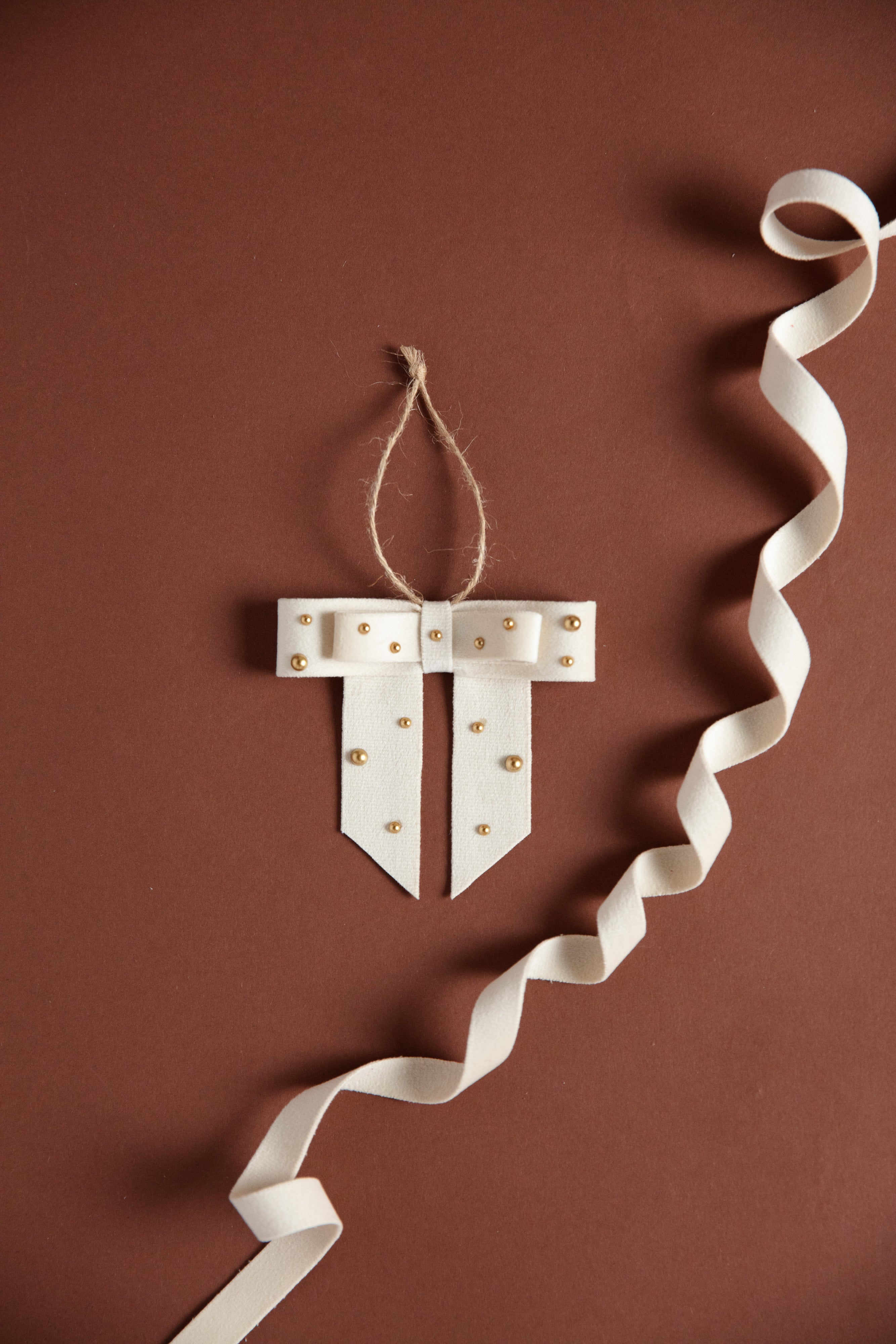 Cream Bow Ornament – Local Story